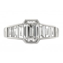 Art Deco style emerald cut and tapered trapeze cut diamond ring